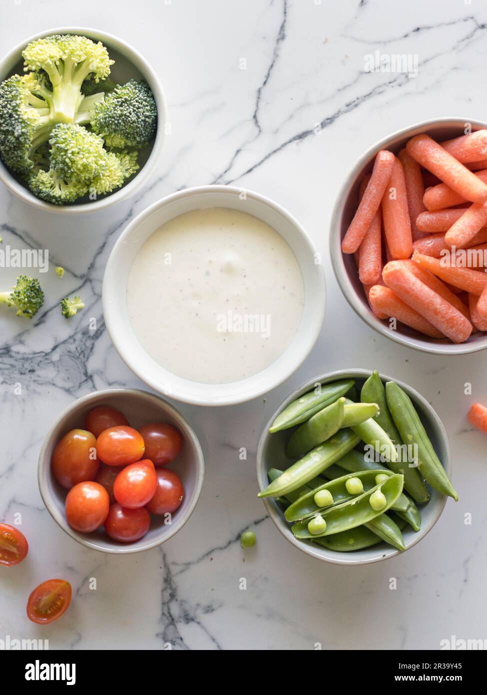 Veggie snack with ranch sauce Stock Photo - Alamy