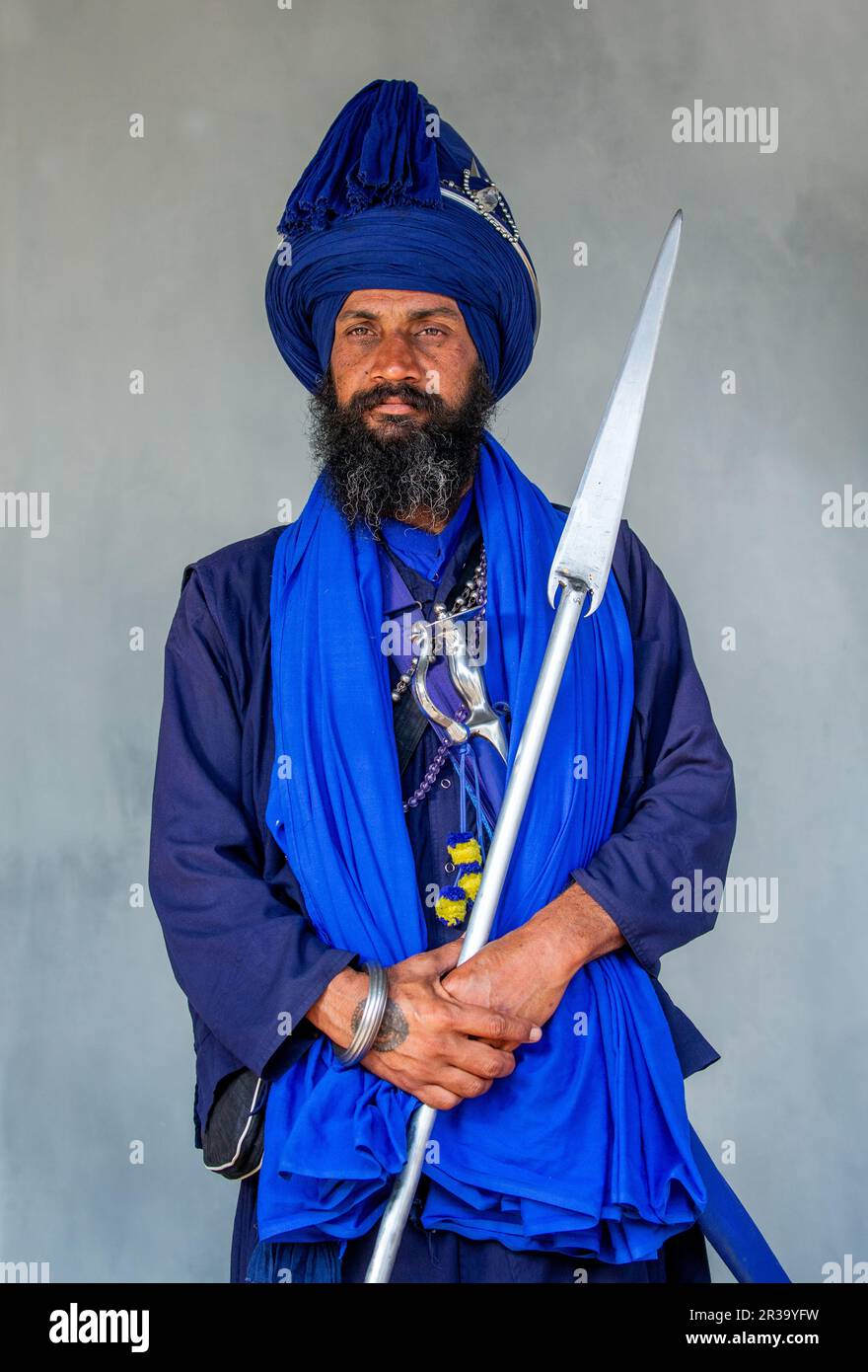 Portrait of a Sikh warrior in traditional dress with weapons Stock ...