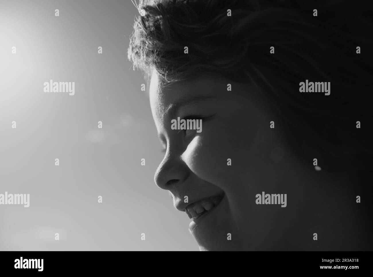Close-up profile portrait of a cute happy child. . Smiling kids mouth ...