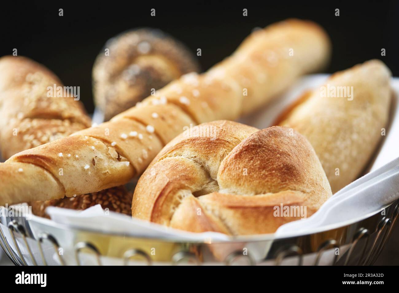 Assorted bread rolls in a bread basket Stock Photo - Alamy