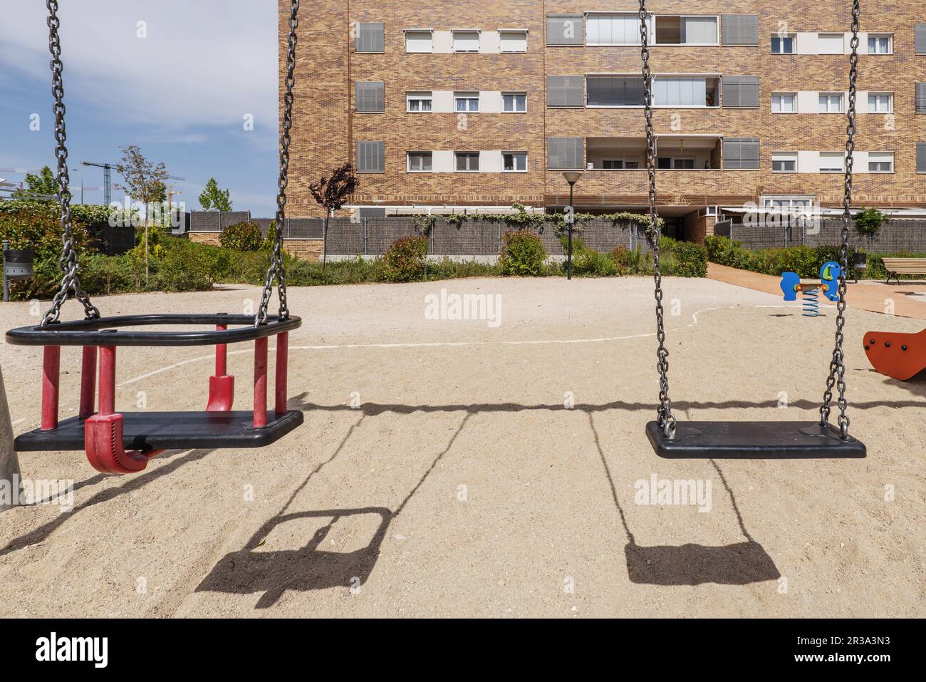 Common areas of a building with a sand esplanade, some games for ...