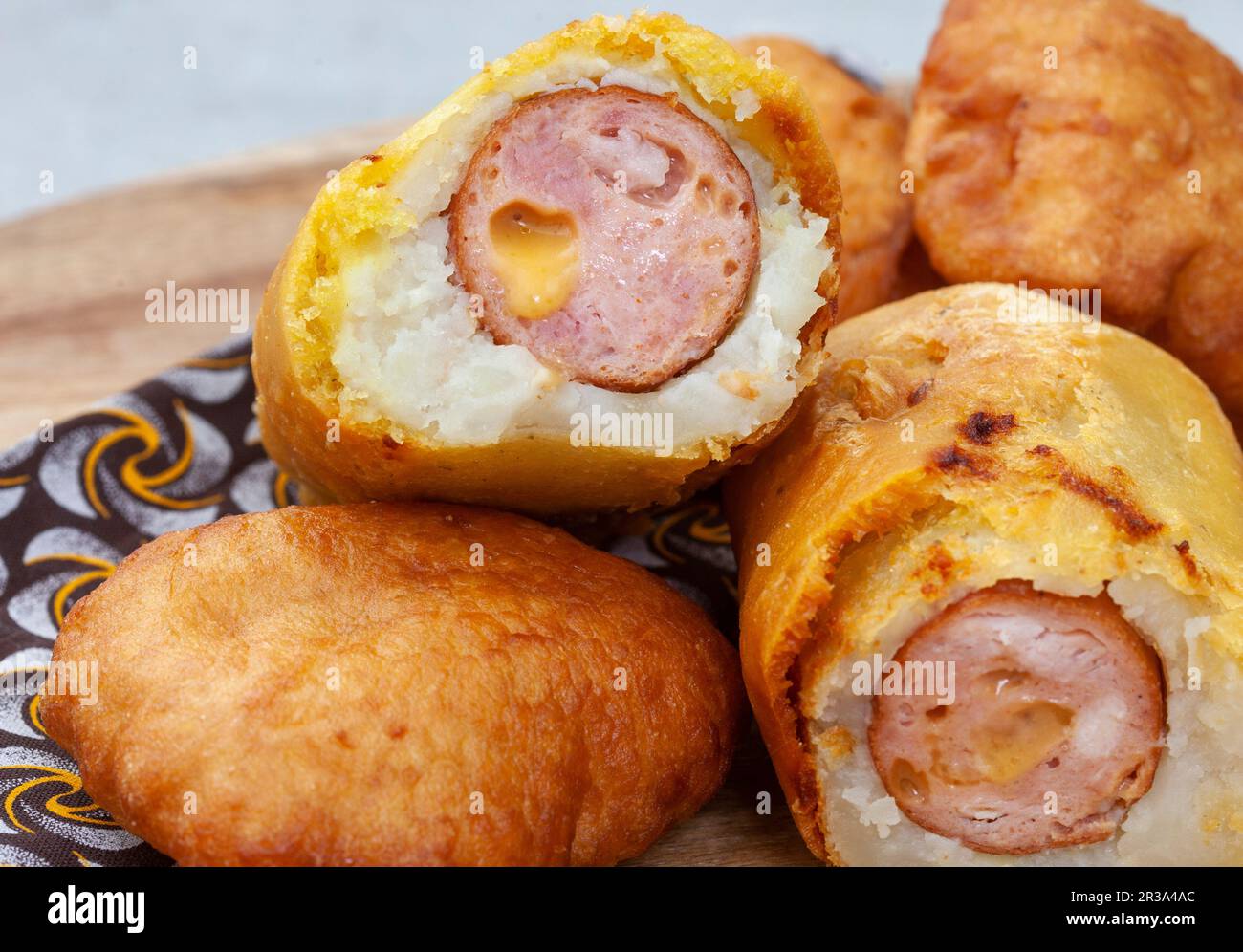 Traditional South African Russian sausage Sputnik or deep fried mash ...