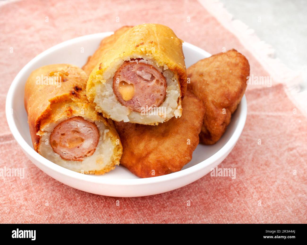 Traditional South African Russian sausage Sputnik or deep fried mash ...