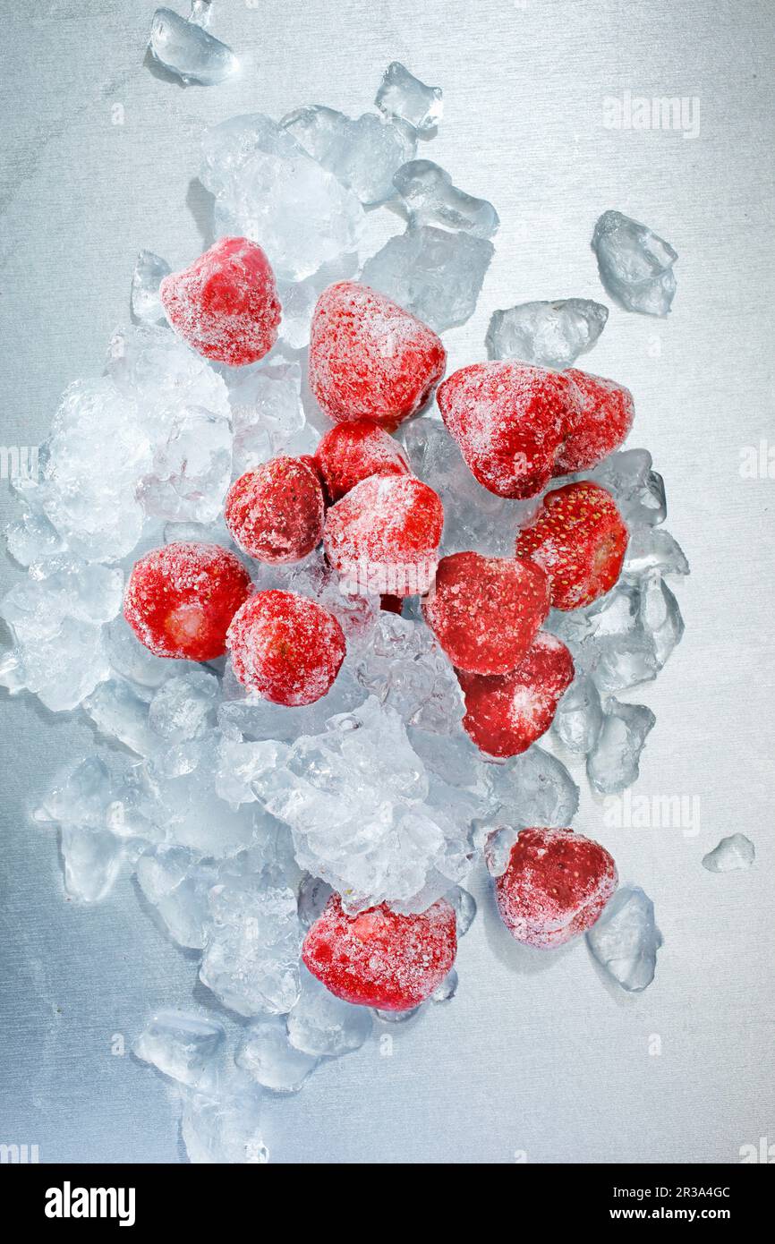 Strawberries with ice cubes hi-res stock photography and images - Alamy