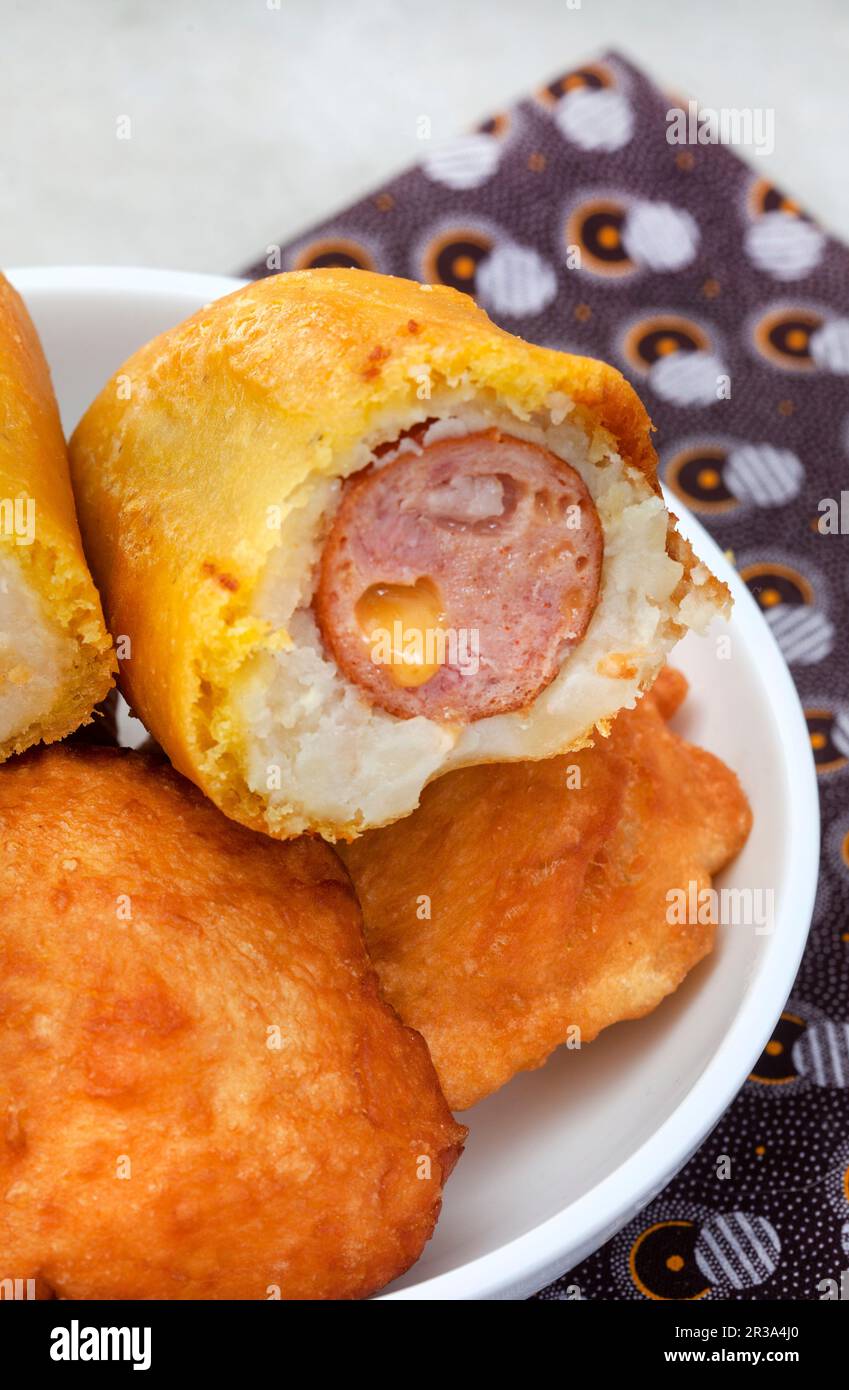 Traditional South African Russian sausage Sputnik or deep fried mash ...