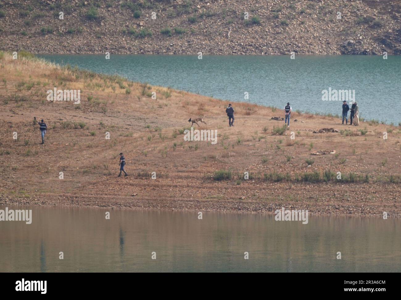 Personnel at Barragem do Arade reservoir, in the Algave, Portugal, as ...