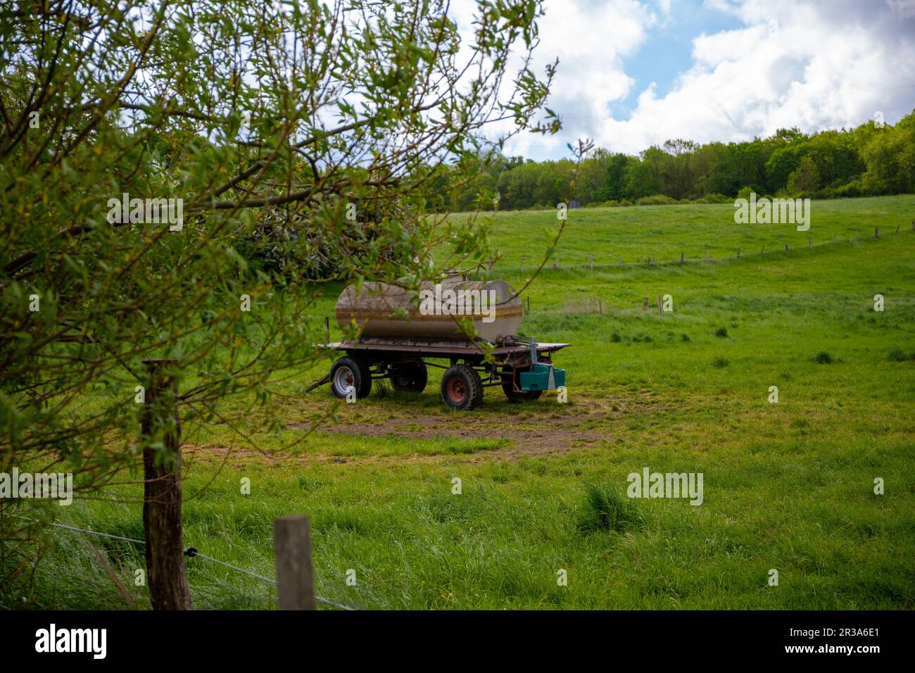 Water tank on an animal pasture Stock Photo - Alamy