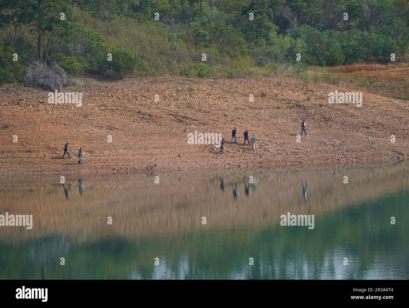 Personnel at Barragem do Arade reservoir, in the Algave, Portugal, as ...