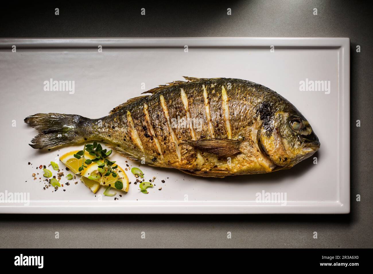Fried sea bream Stock Photo - Alamy