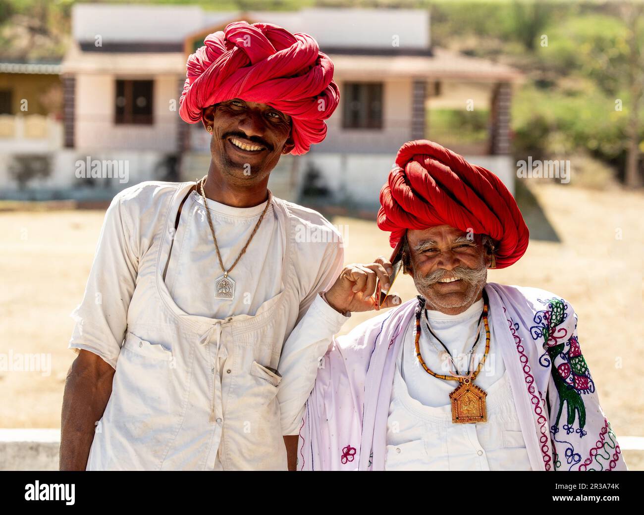 Two men of the Rabari ethnic group in national dress are standing ...