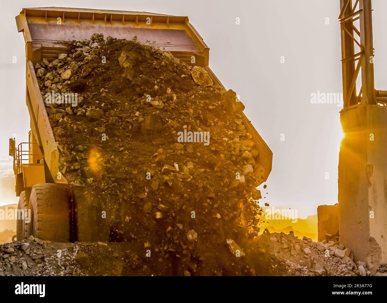 Mining dump trucks transporting Platinum ore for processing Stock Photo ...