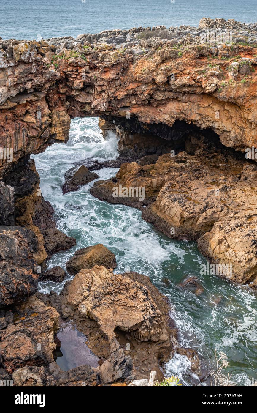 Boca do Inferno cave - Hell's mouth - cliffs and archway formed by crashing waves near Cascais ...