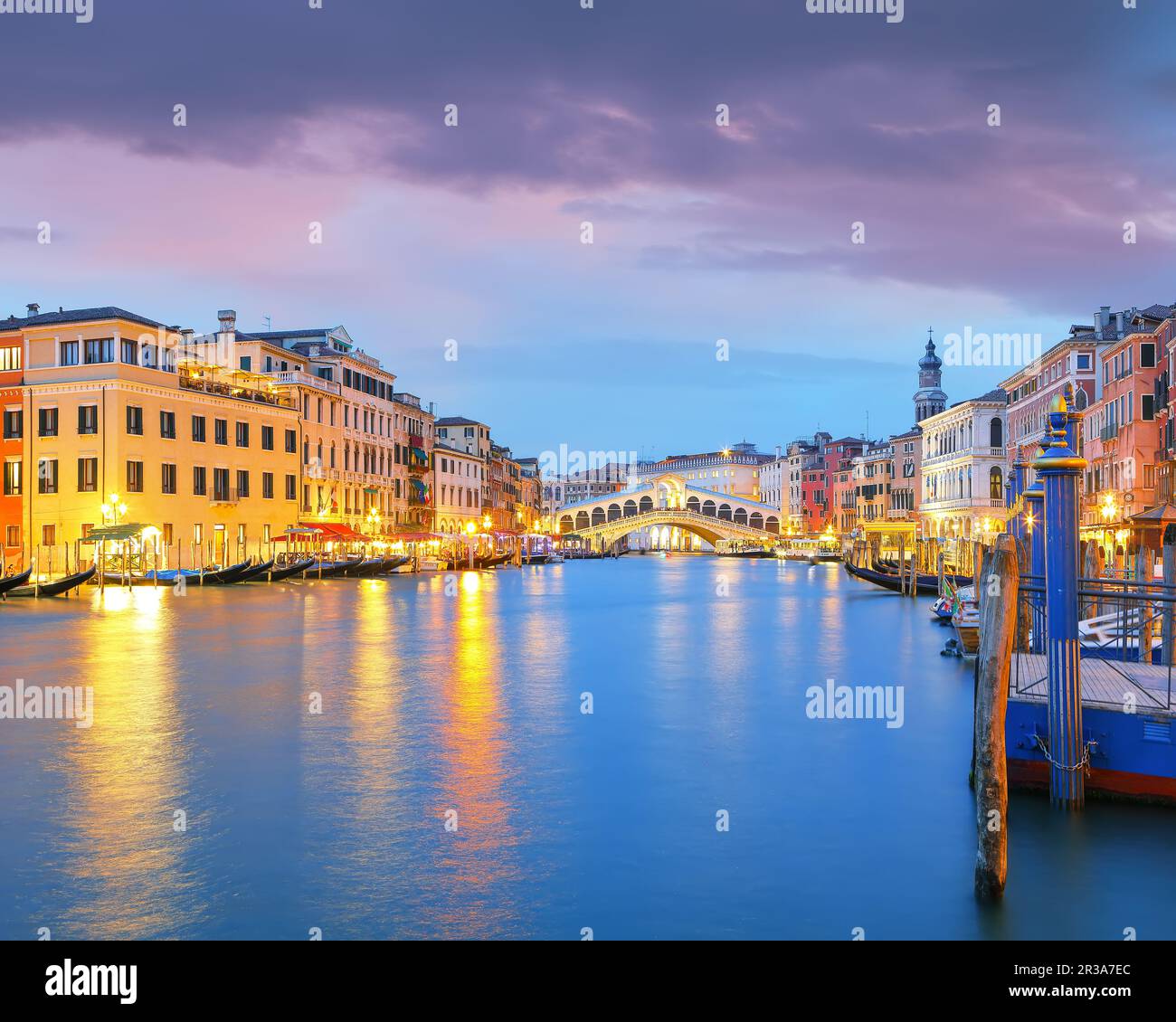 Stunning sunset and evening cityscape of Venice with famous Canal ...