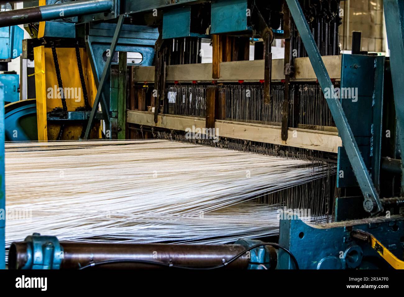 Cotton Thread lines for a copwinder weft assembly line loom Stock Photo ...