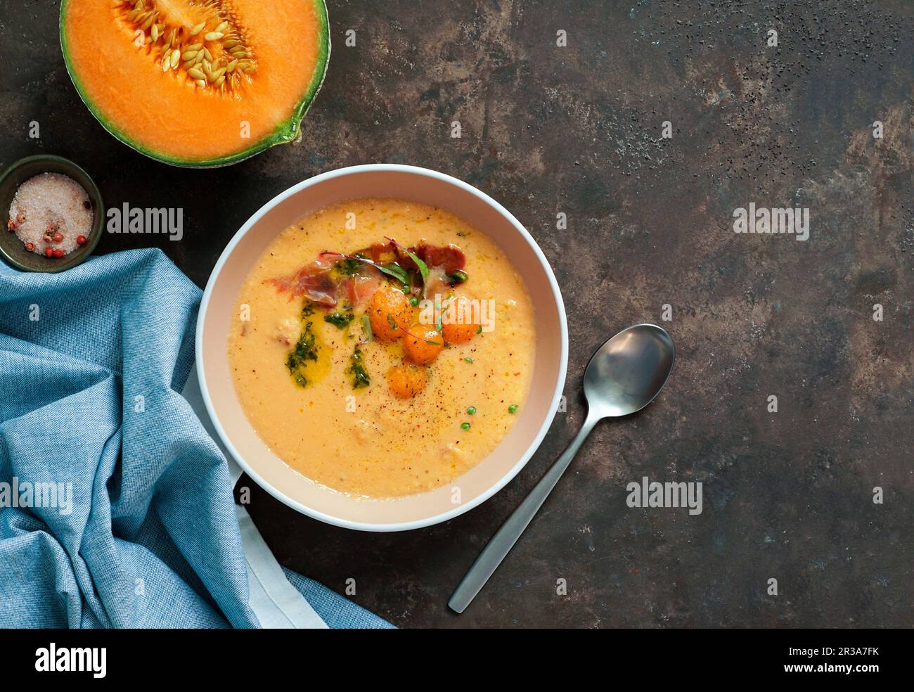 Orage melon cold soup, with jamon, typical spanish dish Stock Photo - Alamy