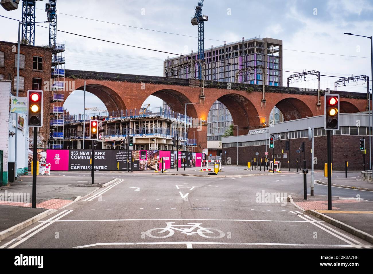 Stockport railway viaduct surrounded by construction and redevelopment ...