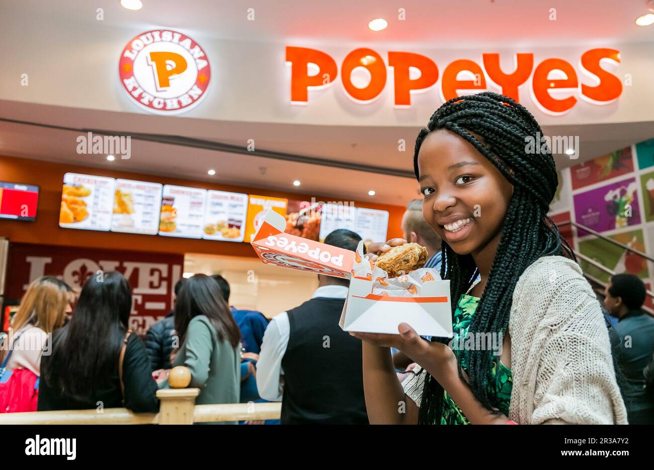 Customers at a Popeyes Take Out Fast Food Restaurant Stock Photo - Alamy