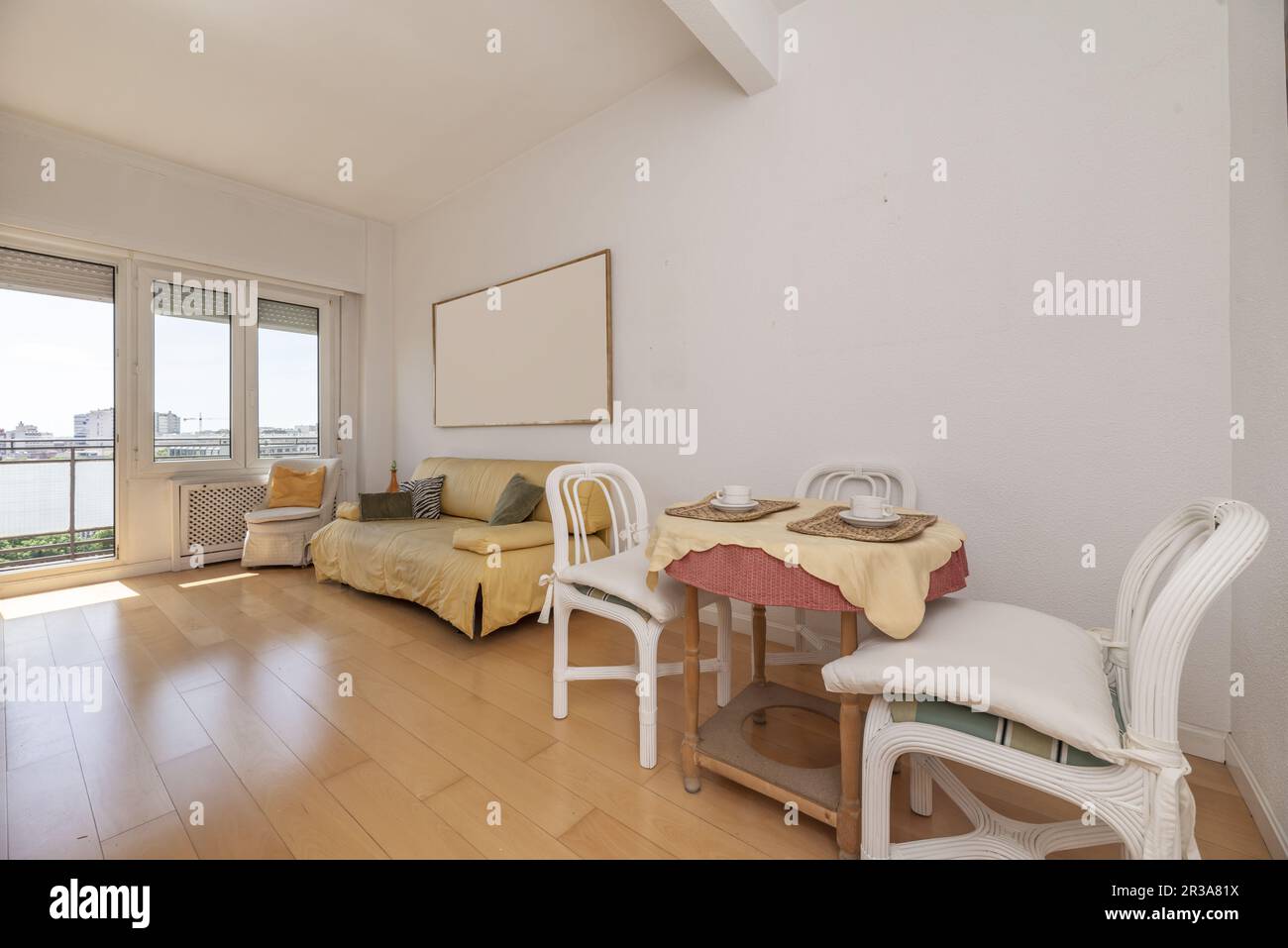 Living room of a house with access to a terrace with views through a ...
