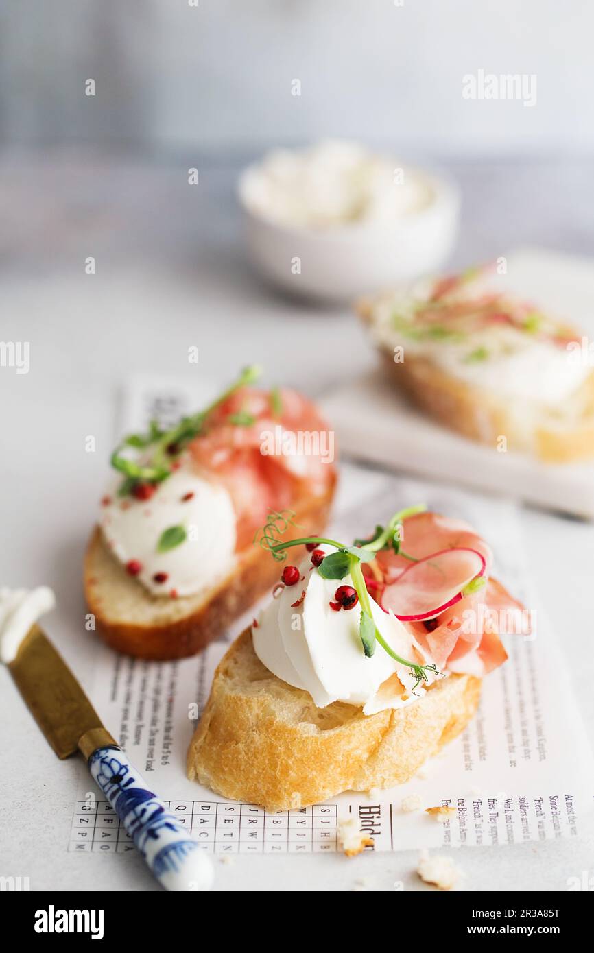 Bread with smoked bacon and cream cheese. Toasted bread slice with meat ...