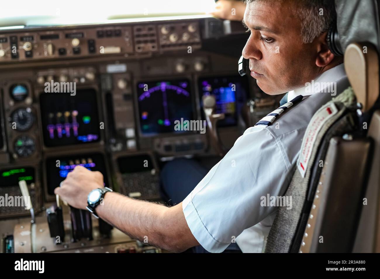 Over the Shoulder of a Indian Pilot in a Jumbo Cockpit Stock Photo - Alamy
