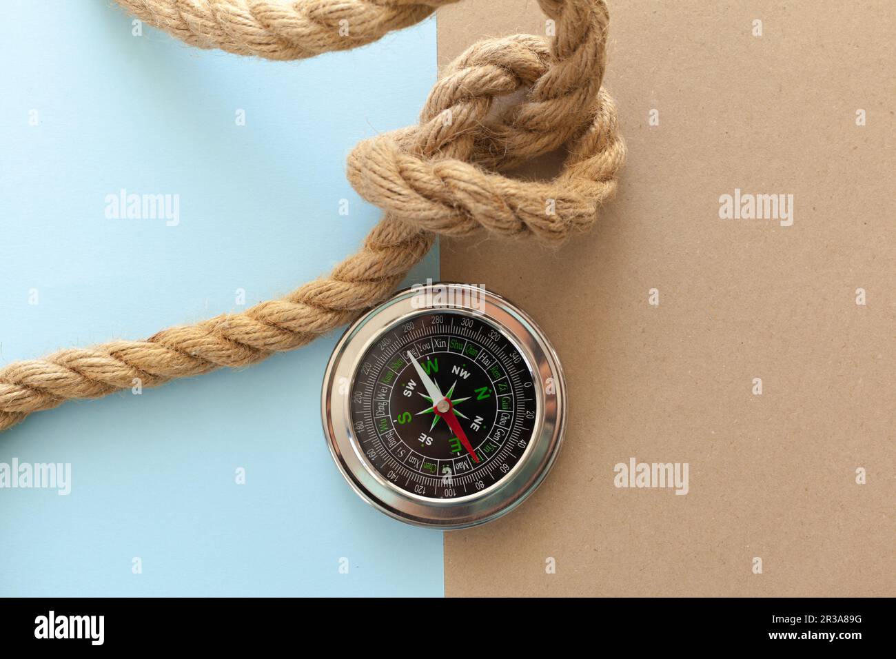 ship ropes and compass Stock Photo - Alamy