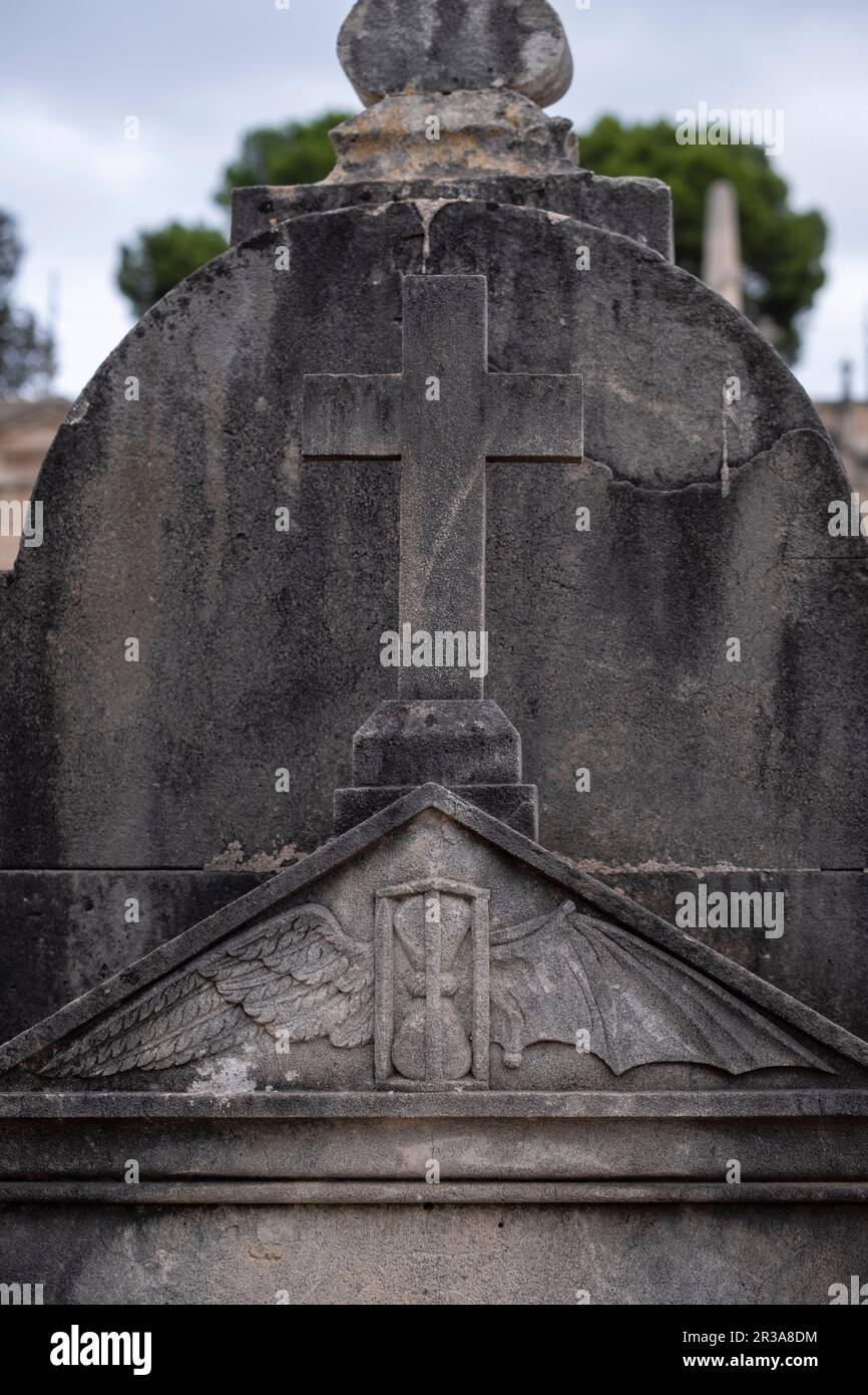 symbol with hourglass, owl wing and bat wing, Palma cemetery, Mallorca ...