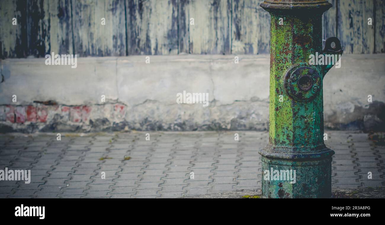 Old out of order street water pump Stock Photo - Alamy