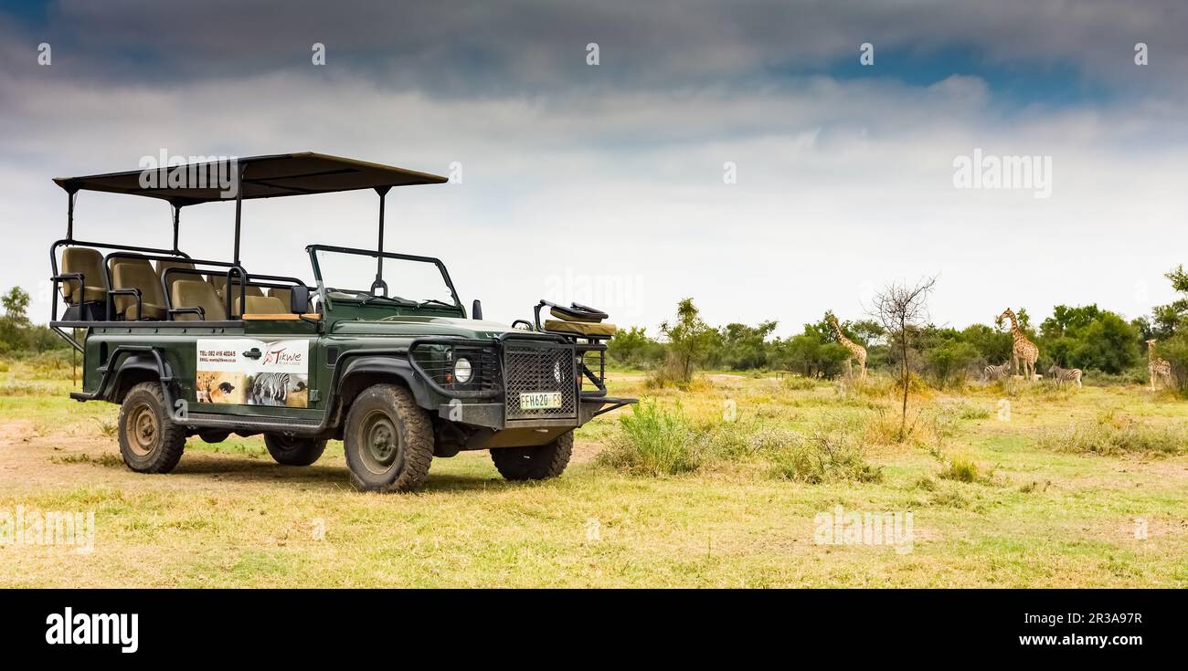 Empty 4x4 waiting for tourists to take a safari tour of game reserve ...