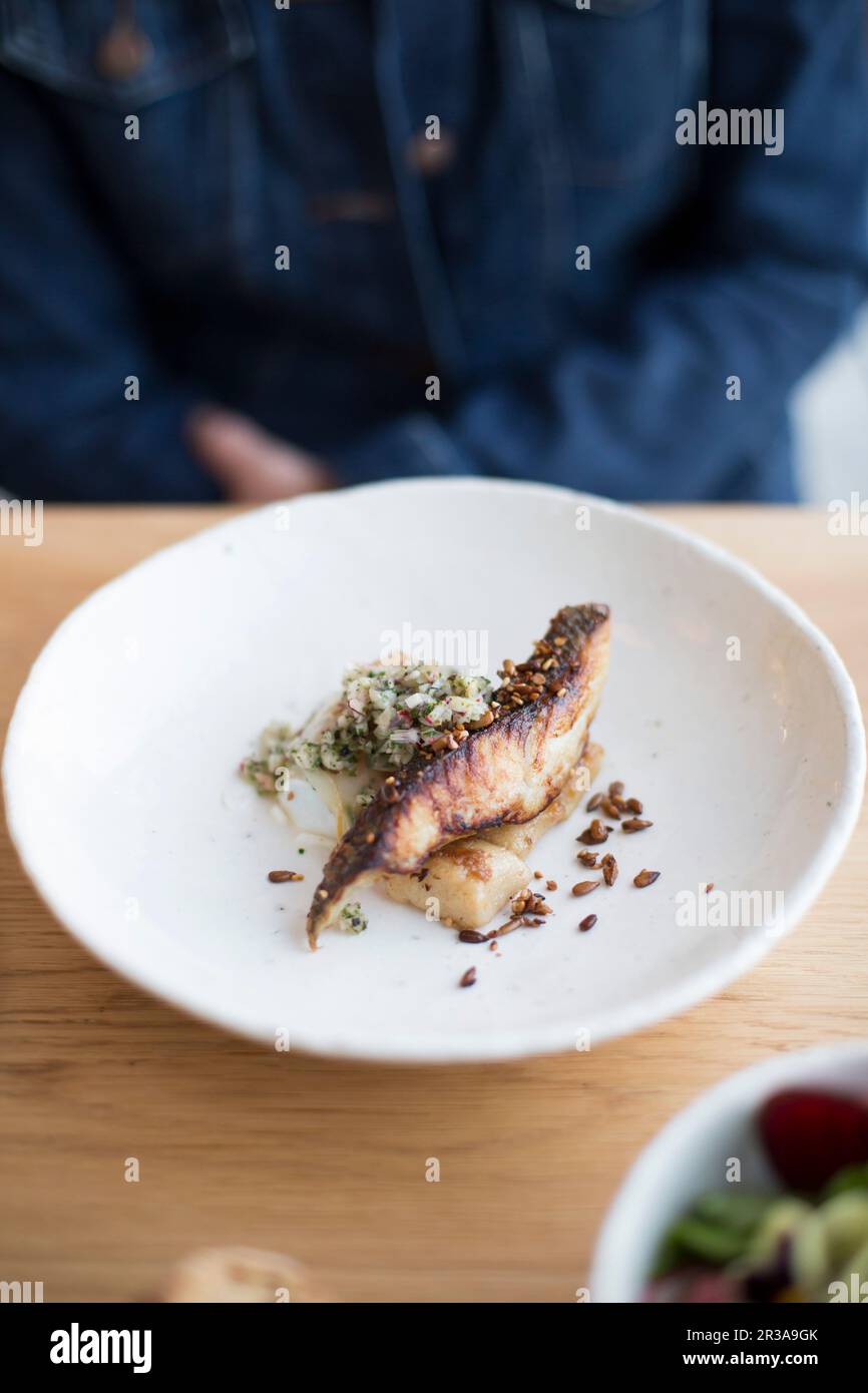 Grilled fish in a restaurant Stock Photo - Alamy