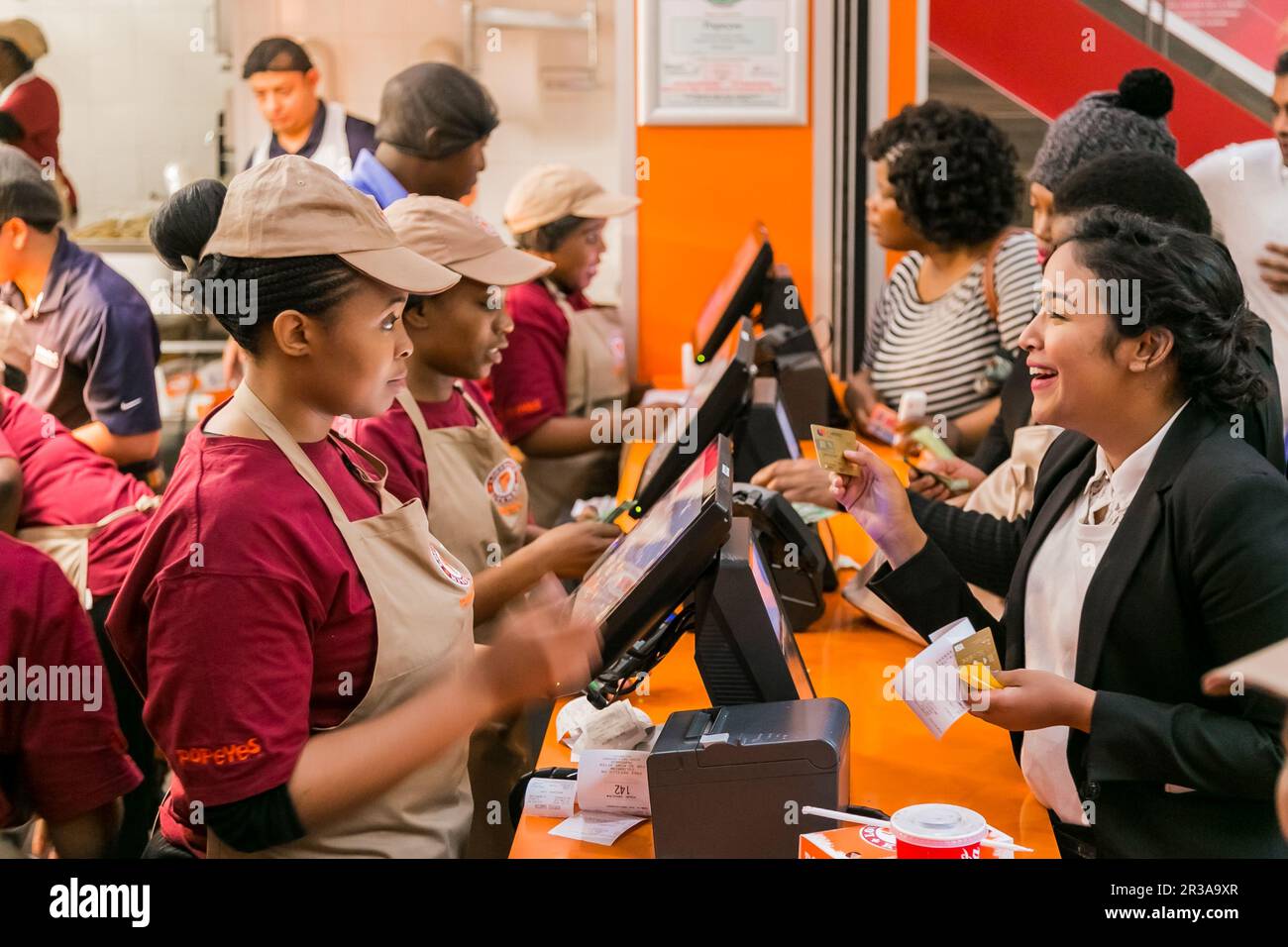Customers at a Popeyes Take Out Fast Food Restaurant Stock Photo - Alamy