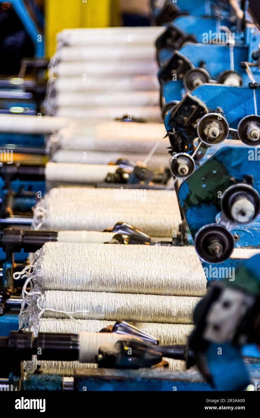 Cotton Thread Bobin on a copwinder weft assembly line loom Stock Photo ...