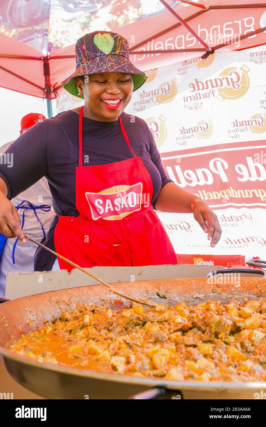 Diverse African vendors cooking and serving various bread based street ...