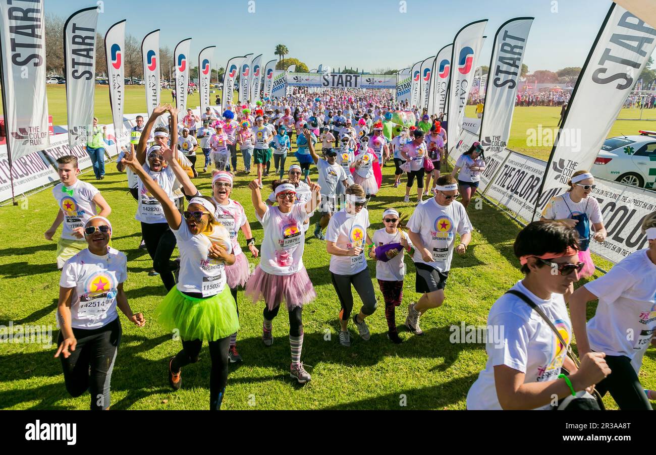 Diverse people running in The Color Run Marathon in Johannesburg Stock ...