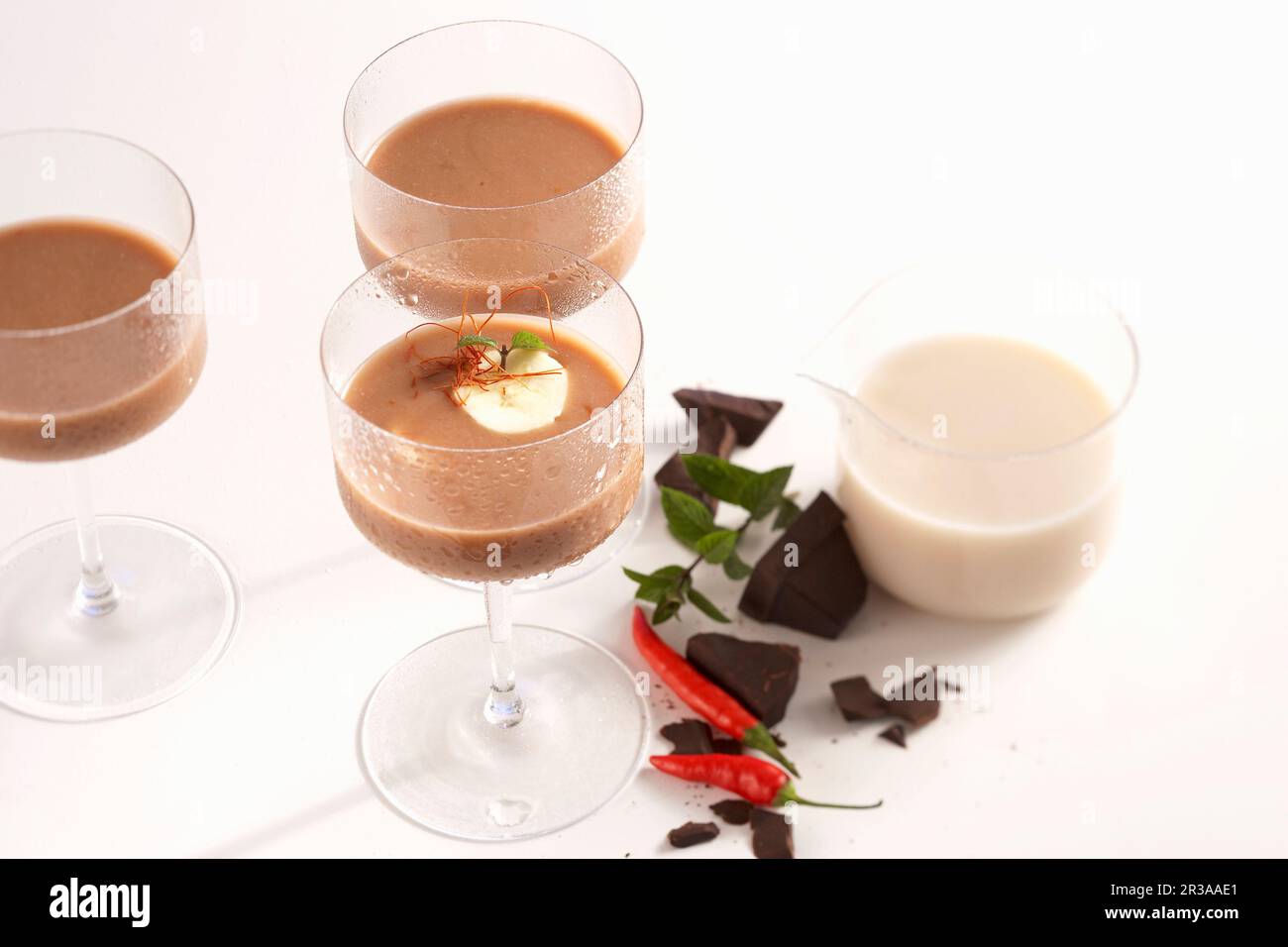 Cold banana chocolate shake with chili and honey Stock Photo - Alamy