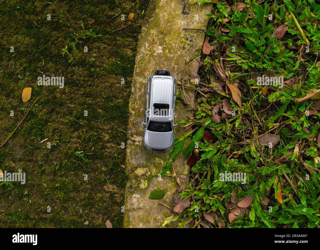 Concept for travelling with a car. Photo of a toy car placed in the ...