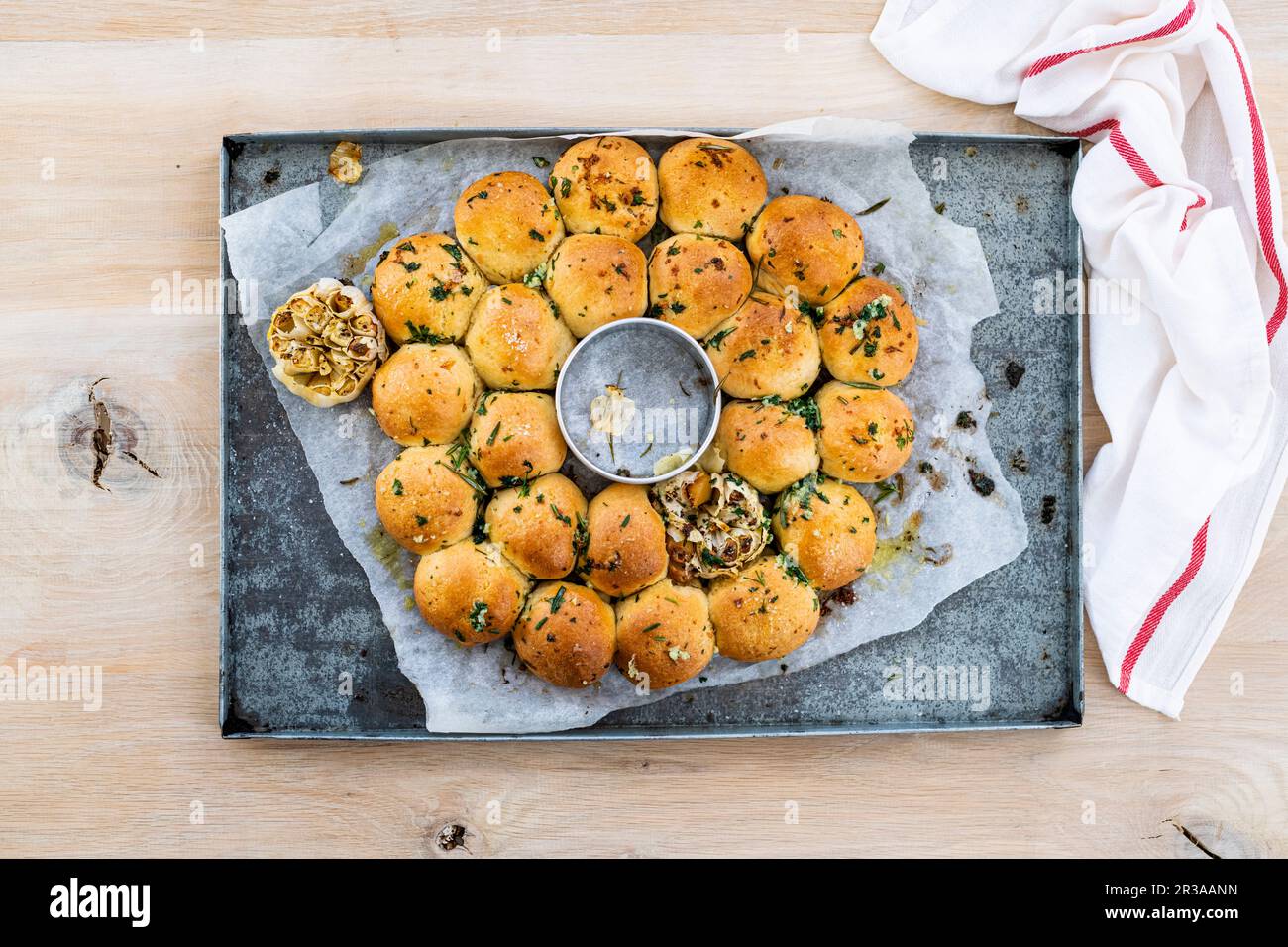 Garlic and herb bread 'sun' Stock Photo - Alamy