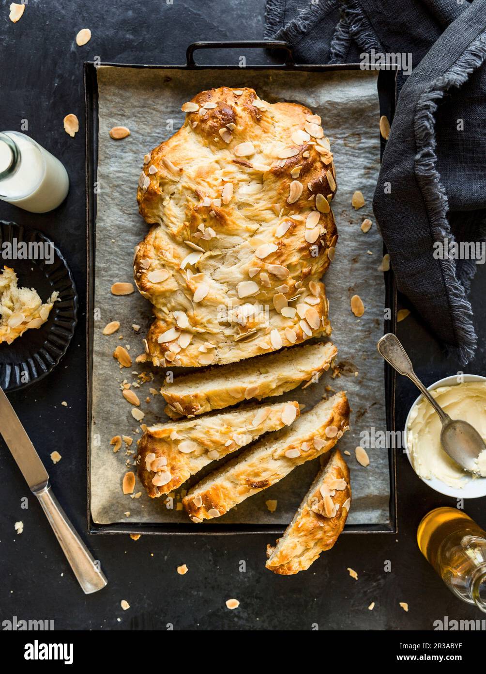 Yeast bread with almond flakes Stock Photo - Alamy