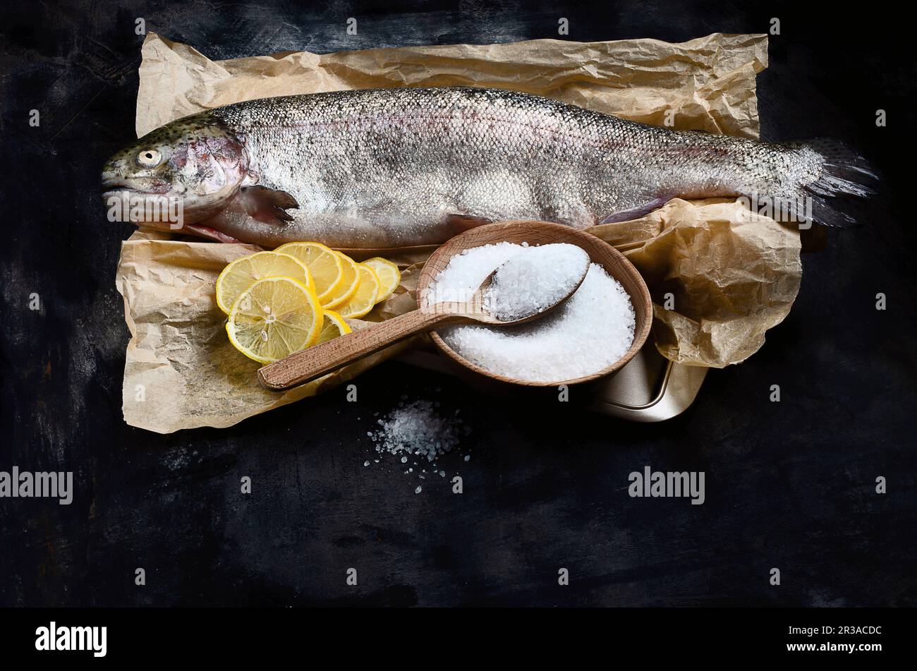 Whole fresh salmon trout with salt and lemon Stock Photo - Alamy