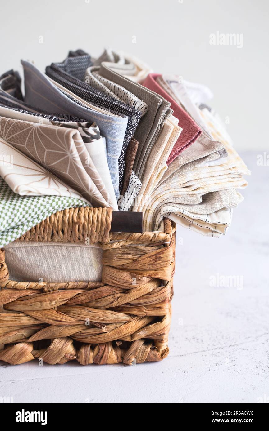 Kitchen textile. stack of fabrics in different colors and textures ...