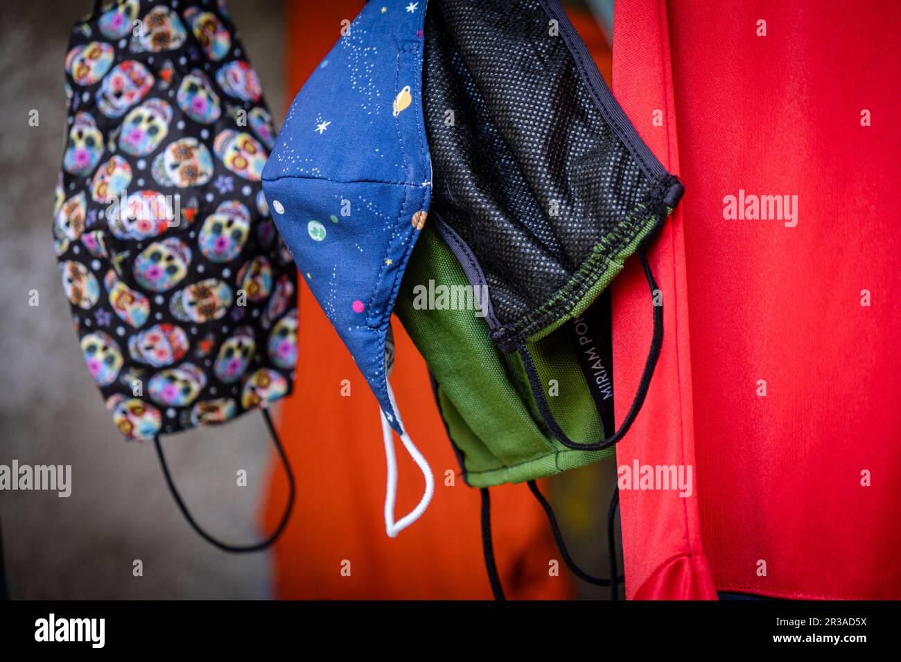laundry of anti-virus masks hanging in a dryer Stock Photo - Alamy