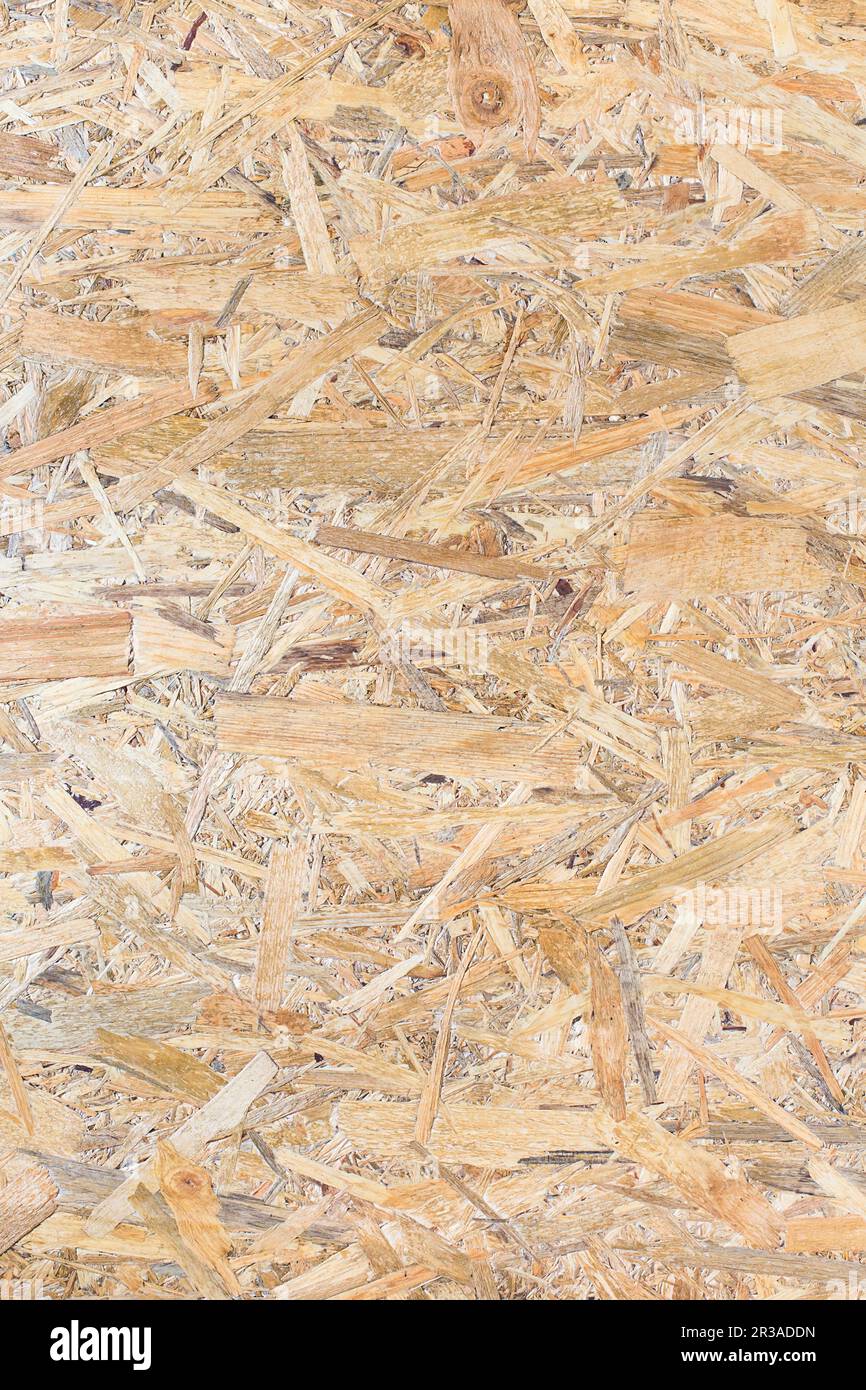 OSB panel texture. Oriented Strand Board. Chipboard building material. OSB wooden panel made of ...
