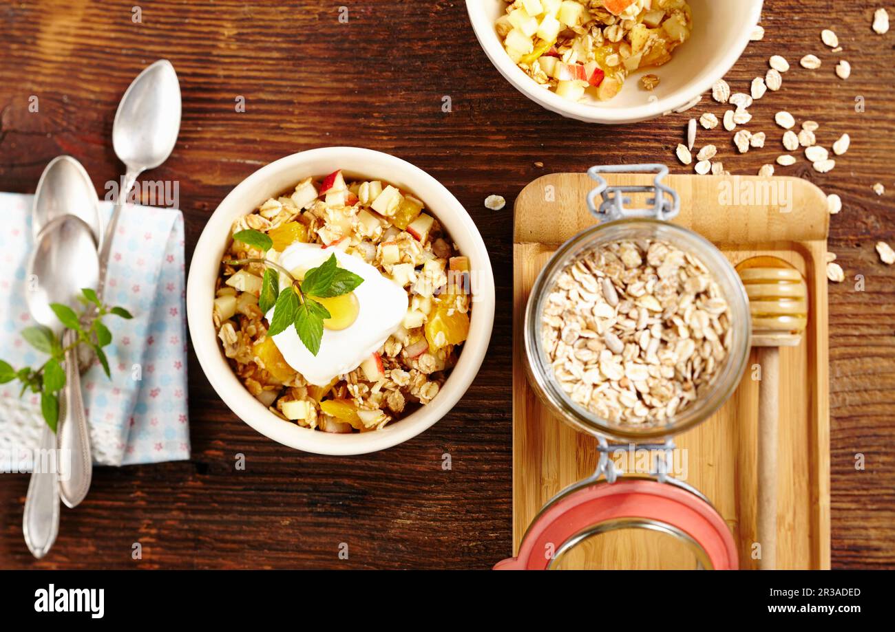 Swiss Bircher muesli with oats, apples, pears, oranges, yoghurt and ...