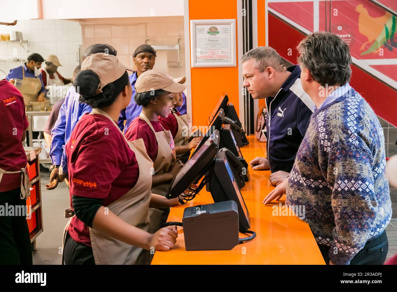 Customers at a Popeyes Take Out Fast Food Restaurant Stock Photo - Alamy