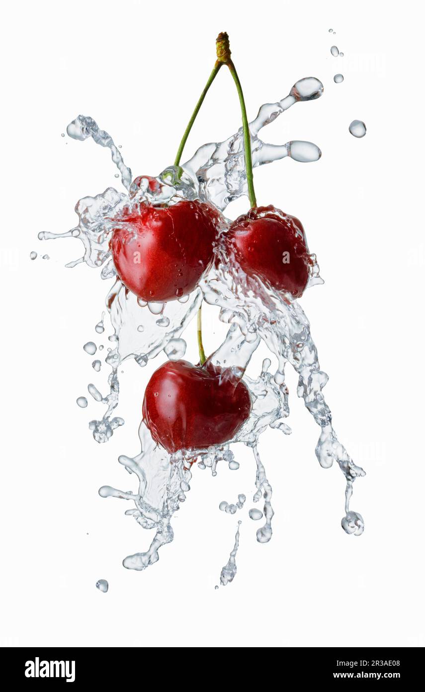 Cherries with a splash Stock Photo - Alamy