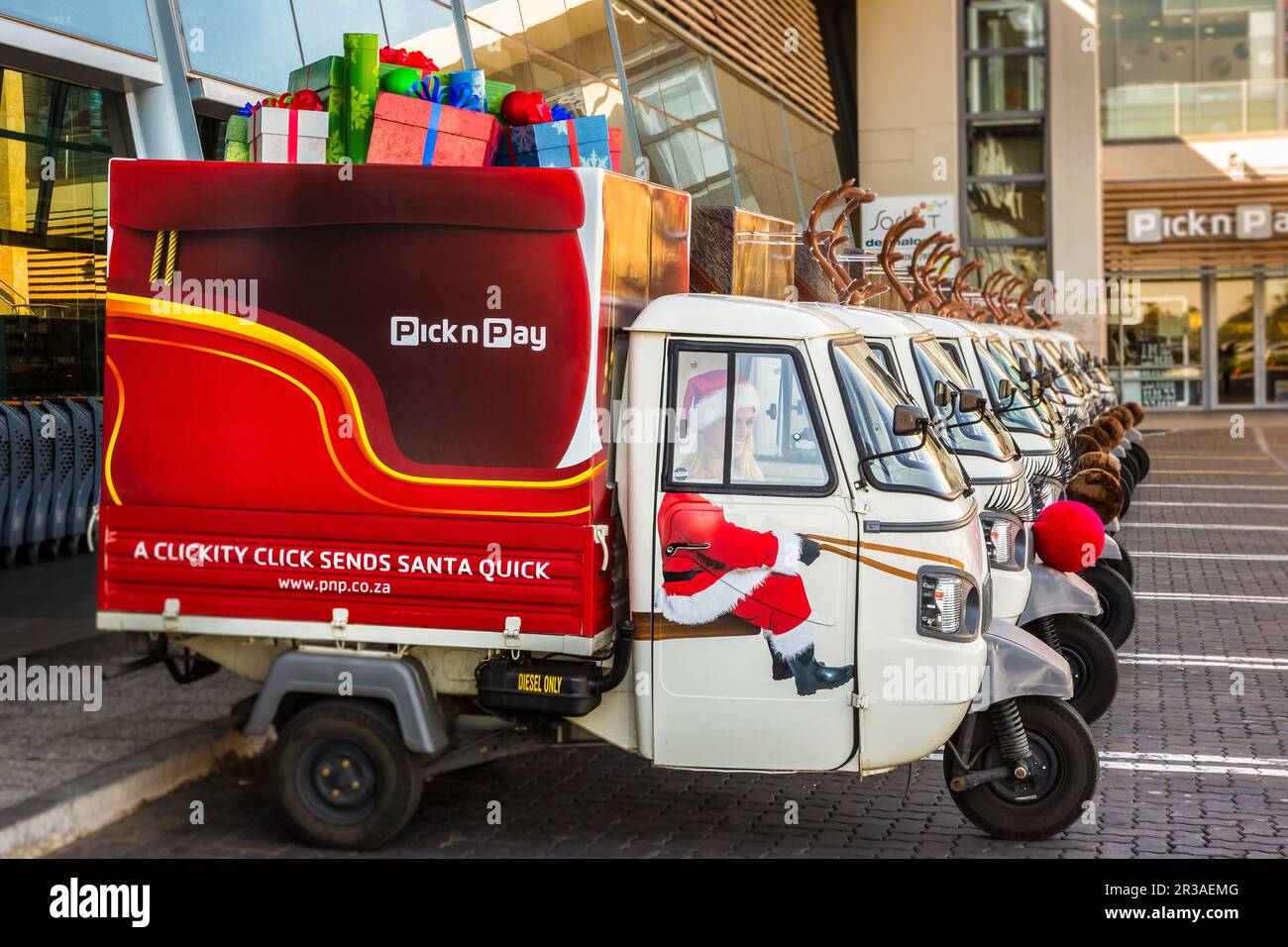Small TukTuk Grocery Store Home Delivery Vehicles lined up at a ...