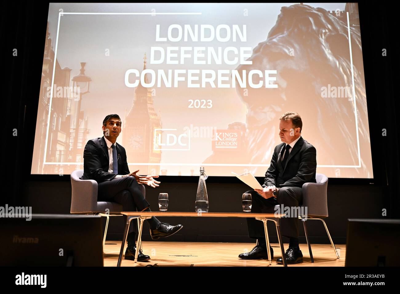 Britain's Prime Minister Rishi Sunak, left, speaks with Director of the ...