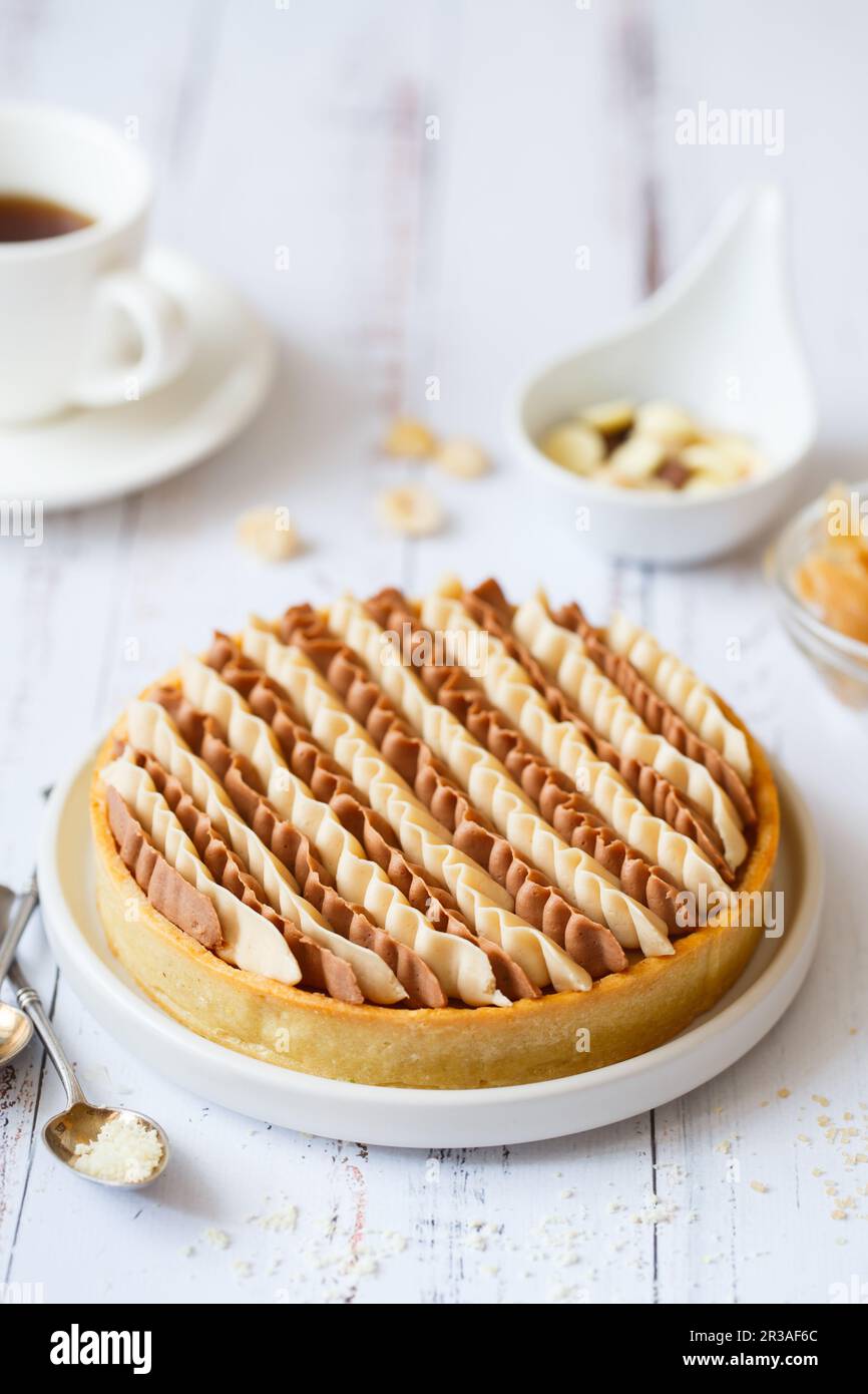 Delicious mini tarts with nuts and custard. Assortment of delicious and ...