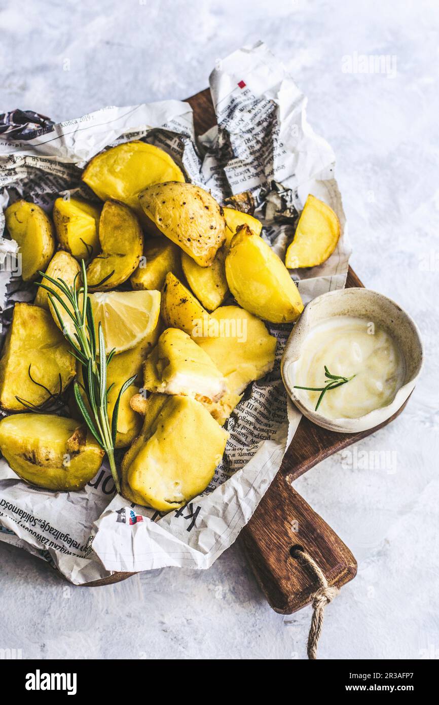 Fish and chips on newspaper Stock Photo - Alamy