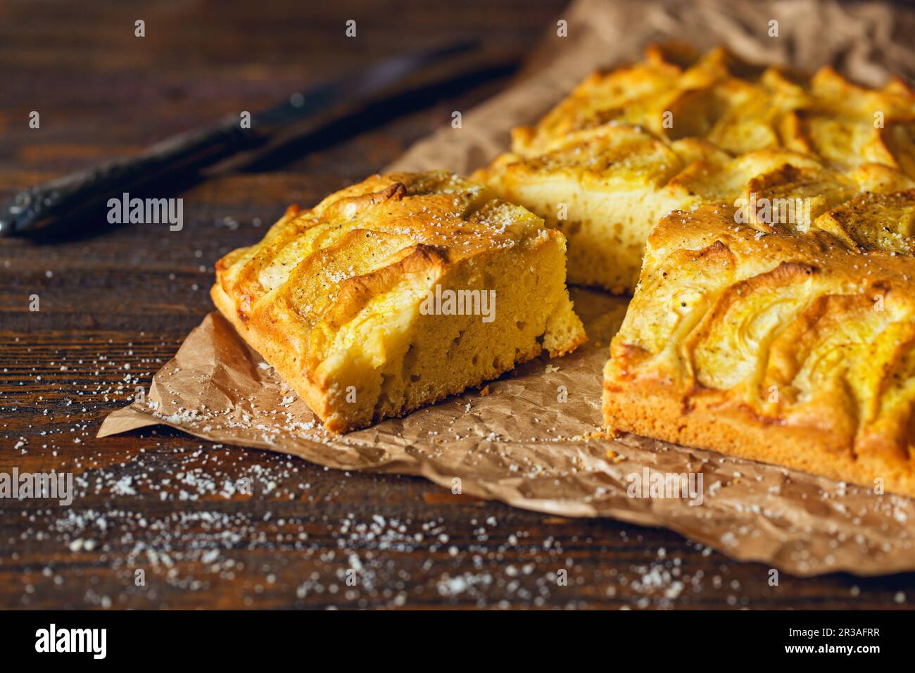 Homemade rustic apple pie on a wooden old vintage table. Dark ...