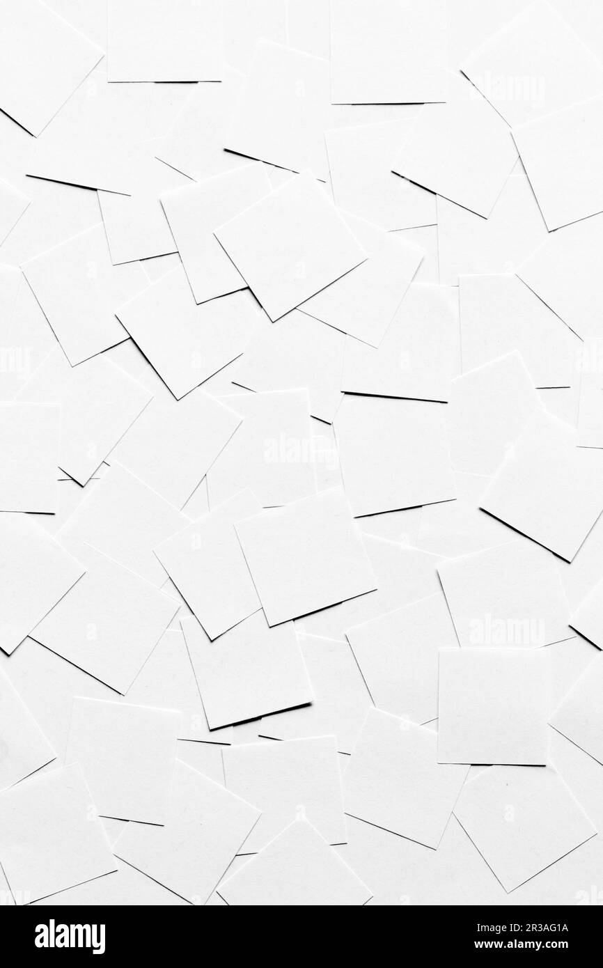 Pile of blank pieces of paper scattered around Stock Photo - Alamy